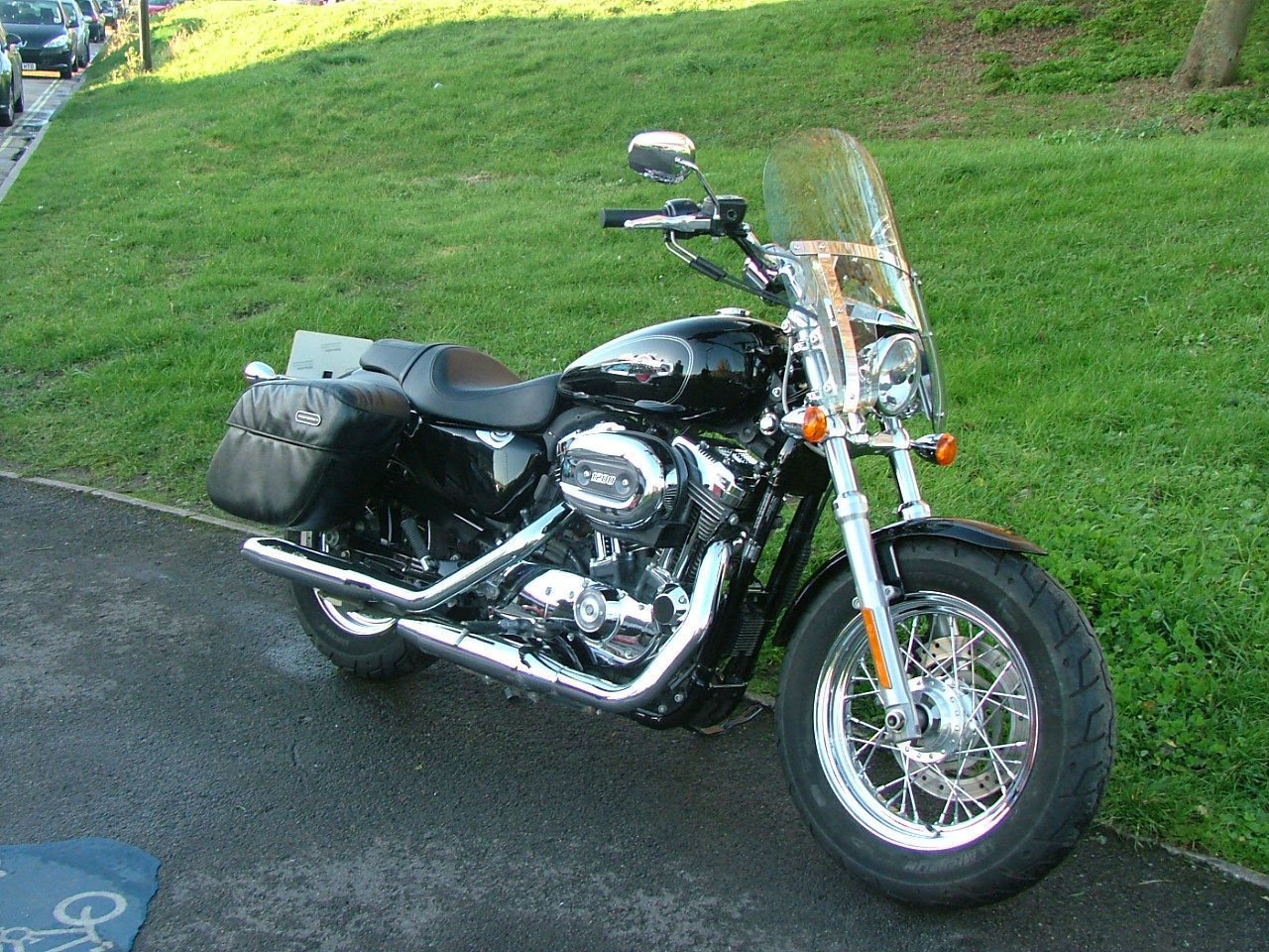 Harley-Davidson XL1200C Custom Sportster with panniers and screen